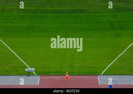 Javelin Thrower sector on grass background. Track and field Stock Photo ...