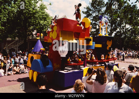 mickey mouse atop a float on the mickeys jammin jungle parade in the ...
