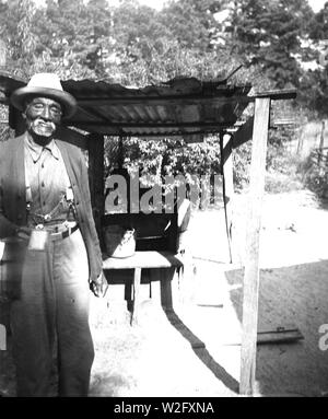 Uncle Billy McCrea, Jasper, Texas, standing at his well ca. September ...