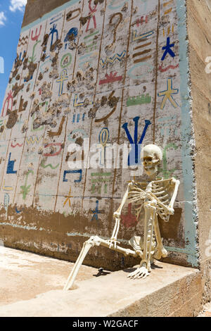 Skeleton hanging out at Ludwig mine Nevada ruins Stock Photo - Alamy