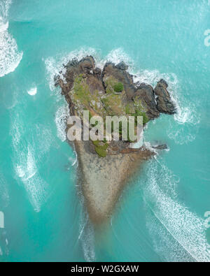 An island of trees in the middle of a turquoise lake. Very beautiful ...