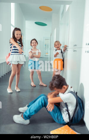Rude children with bad behavior bullying their classmate Stock Photo ...