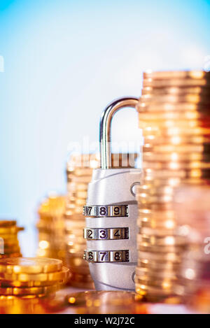 Silver combination lock with several stacks of coins | usage worldwide ...