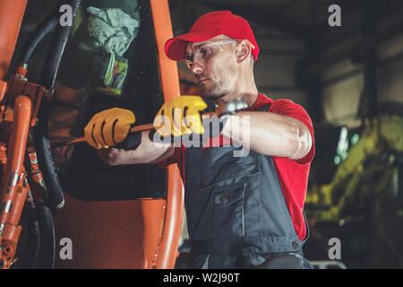 industrial mechanic repairing heavy industry machine in plant Stock ...