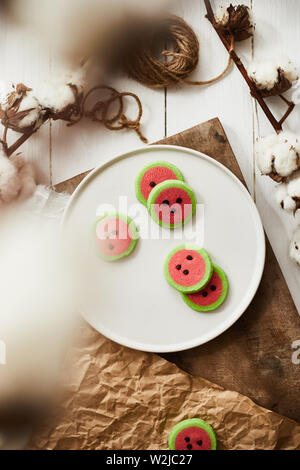 Watermelon slice cookies recipe on background Stock Photo - Alamy