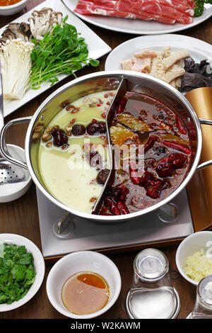 Yin Yang Hot Pot, Chinese Cuisine. Food hot pot two styles. Top view of ...