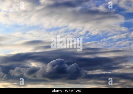 Stunning mixed cloud formations on a blue sky taken in Europe Stock ...
