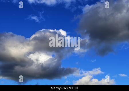 Stunning mixed cloud formations on a blue sky taken in Europe Stock ...