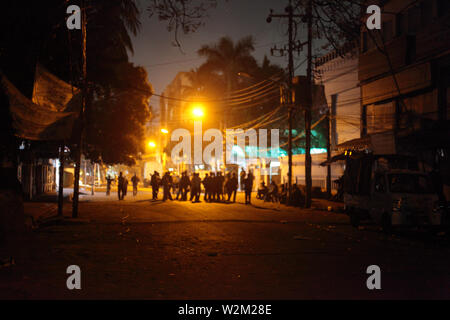 Officers of Rapid Action Battalion (RAB) attend a press conference at ...