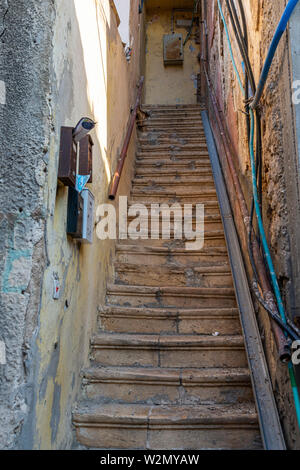 Old concrete aged dirty staircase in a poor village house. Isolated ...