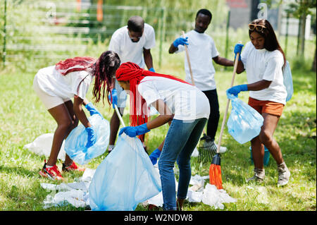 Smiling african american cleaner in uniform showing like and holding ...