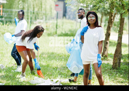 Smiling african american cleaner in uniform showing like and holding ...