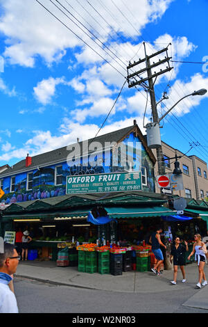 Scene from the pedestrian zone of the Kensington Market area of Toronto ...