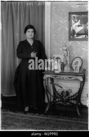 Amy Castles, full length portrait, seated, facing front. Australian ...