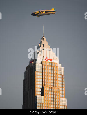 Goodyear Blimp Over Key Tower Stock Photo - Alamy