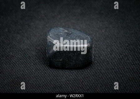 Onyx gemstone deep black gem light tones of deep green and blue Stock ...