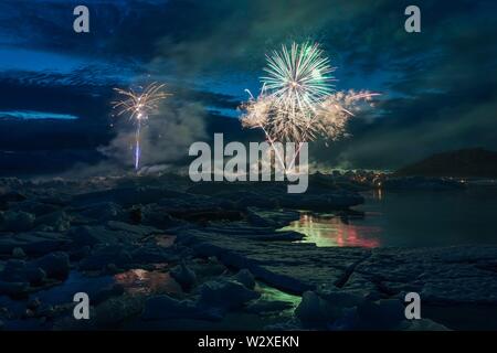 Annual fireworks over the glacier lagoon Jokulsarlon, South Iceland ...