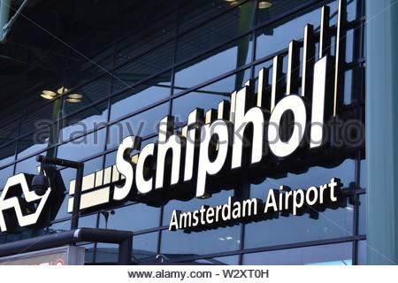 Amsterdam Schiphol Airport Train Station entrance and logo in the Stock ...