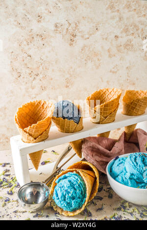 Trendy Color Changing Ice Cream with blue flowers powder, Butterfly Pea ...