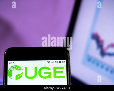 In this photo illustration the UGE International, LTD logo is seen ...