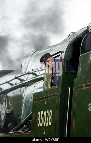 Train crew on Merchant Navy Class steam locomotive "Clan Line Stock ...