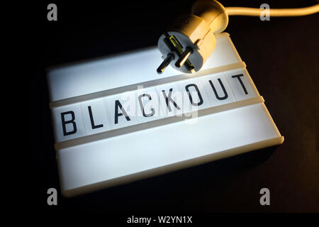 The word blackout on an illuminated panel, power failure Stock Photo ...