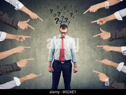 Concept of many questions with the businessman Stock Photo - Alamy