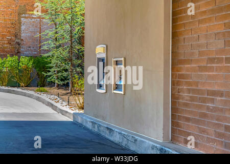 "Cash machine" built into a "brick wall" automated teller ATM Stock Photo: 25241133 - Alamy