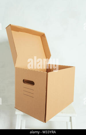 Big cardboard boxes standing insinde a room Stock Photo - Alamy