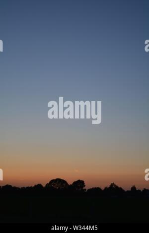 Suble sheds of colour in the sunset sky Stock Photo - Alamy
