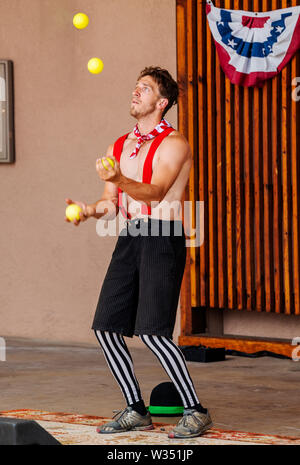 Male juggler performing at Fourth of July event; Salida Circus; Salida ...