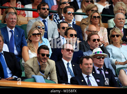 David Beckham and Damian Lewis on day eleven of the Wimbledon ...