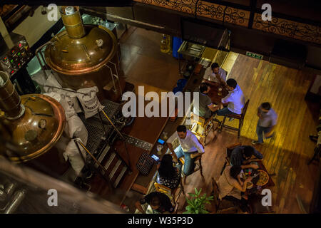 View of beer tanks in Toit Brewpub in Bangalore, India Stock Photo - Alamy