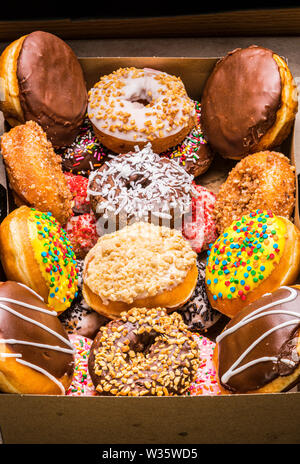 assorted donuts in paper box Stock Photo - Alamy