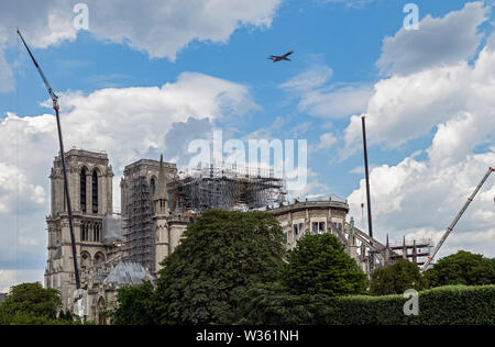 French military aircrafts flying over Notre Dame de Paris Stock Photo ...