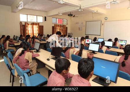 Schoolboy Using Computer In Lab Stock Photo - Alamy