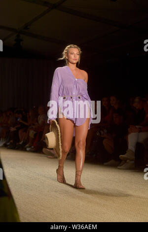 Miami, USA. 12th July, 2019. A model walks the runway during the Monday ...