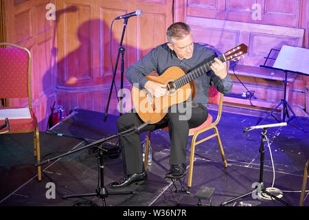 Gary Ryan performing as part of '6 Hands' at The Acapela, Pentyrch ...