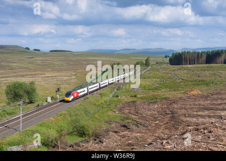 Shap Summit on the west coast mainline. A Virgin trains pendolino ...