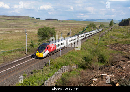 Shap Summit on the west coast mainline. A Virgin trains pendolino ...