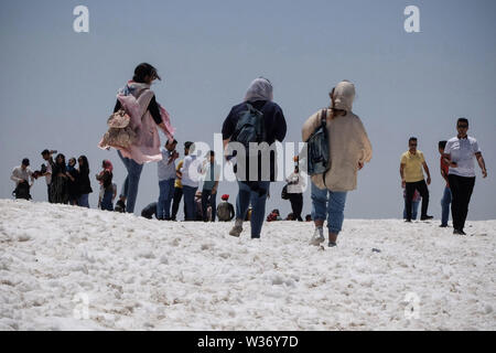 Tehran, Iran. 12th July, 2019. A couple enjoys at Tochal Telecabin 7th ...