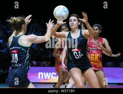 Northern Ireland's Emma Magee (left) in action during the Netball World ...