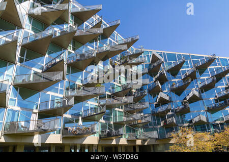 Glass facade of VM-house with triangular balconies in Copenhagen ...
