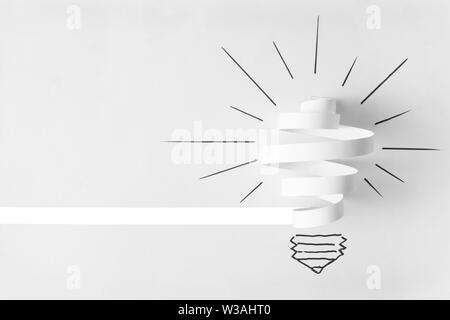 Light Bulb. Paper cut on a white background Stock Photo - Alamy