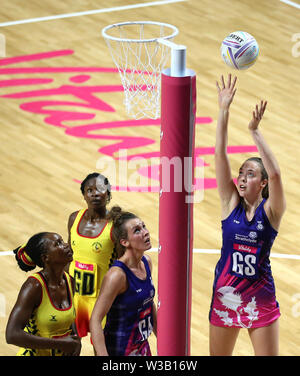 Scotland's Emma Barrie shoots against Barbados' during the Netball ...