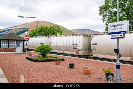 ScotRail Bridge of Orchy rural train station platform with freight ...