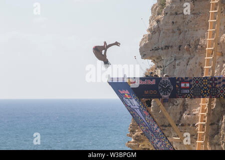 Cliff diver falling into the water in Maryland near Mason Dixon line ...