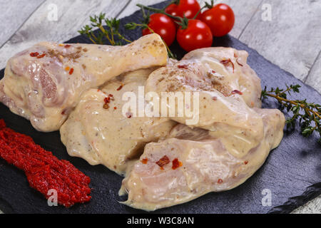 Marinated chicken parts ready for roast Stock Photo - Alamy