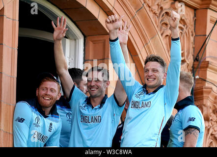 England players celebrate on the balcony after winning the ICC World ...