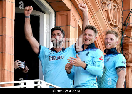 England players celebrate on the balcony after winning the ICC World ...